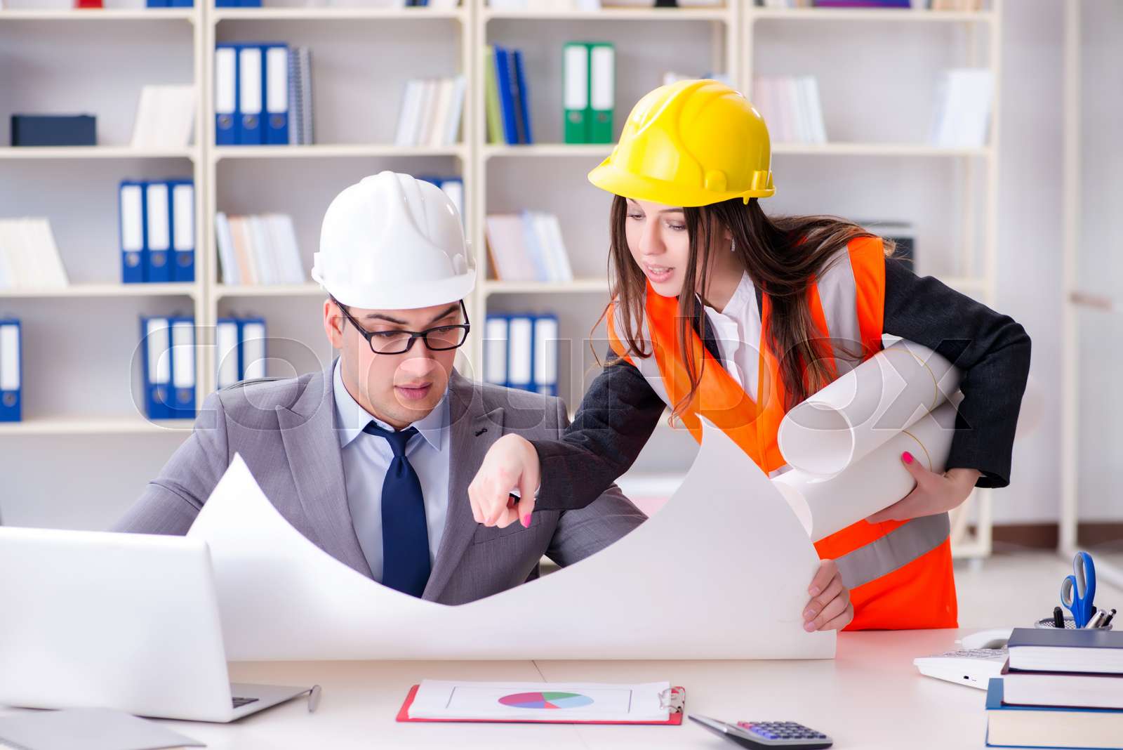 Construction foreman supervisor reviewing drawings | Stock image ...