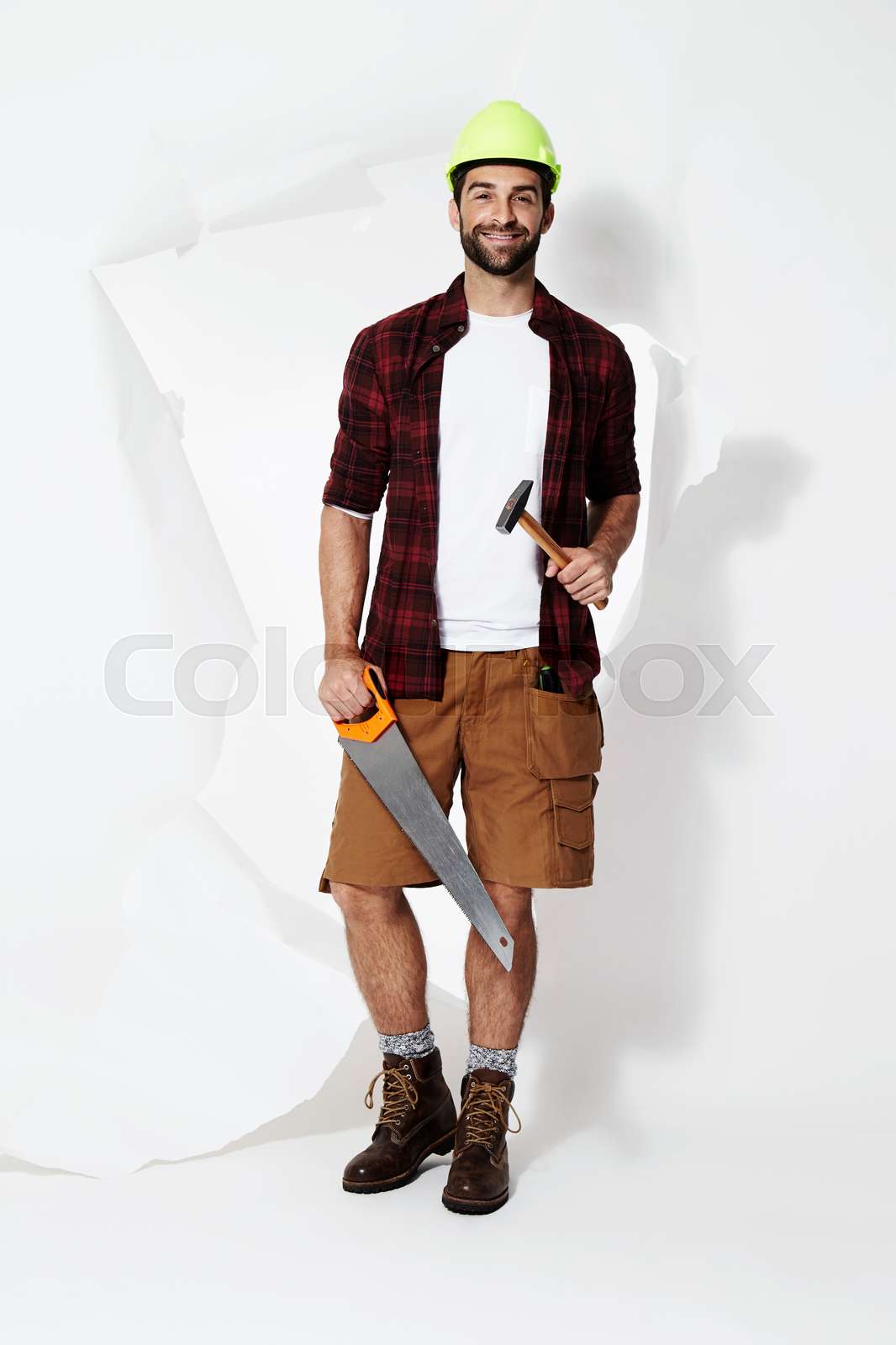 Builder with tools | Stock image | Colourbox