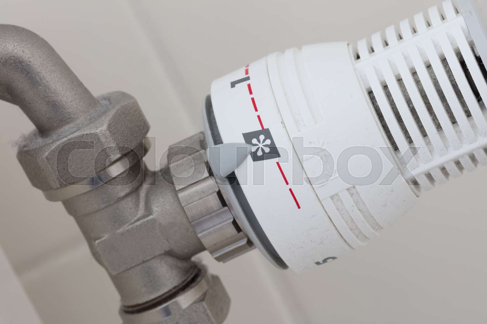 Temperature knob of heating radiator, used and dusty | Stock image ...