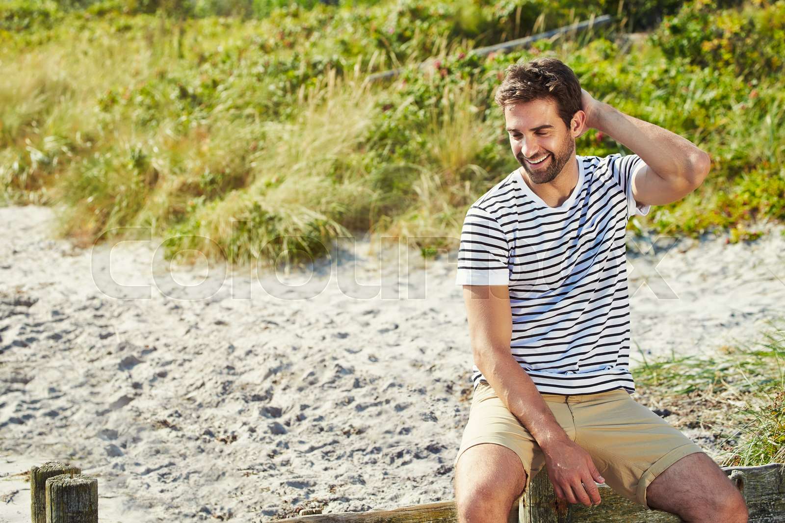 Laughing on beach | Stock image | Colourbox