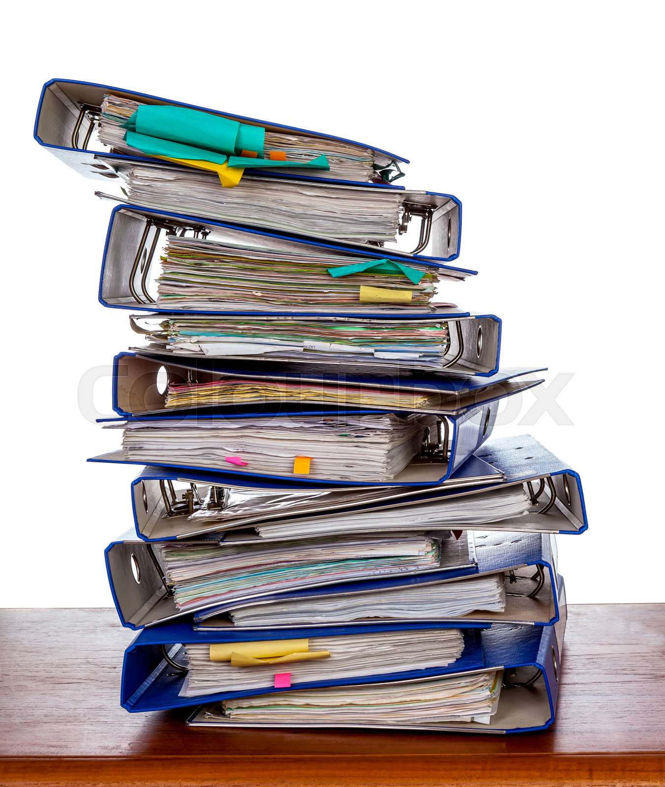 Stack of office folders on a table | Stock image | Colourbox