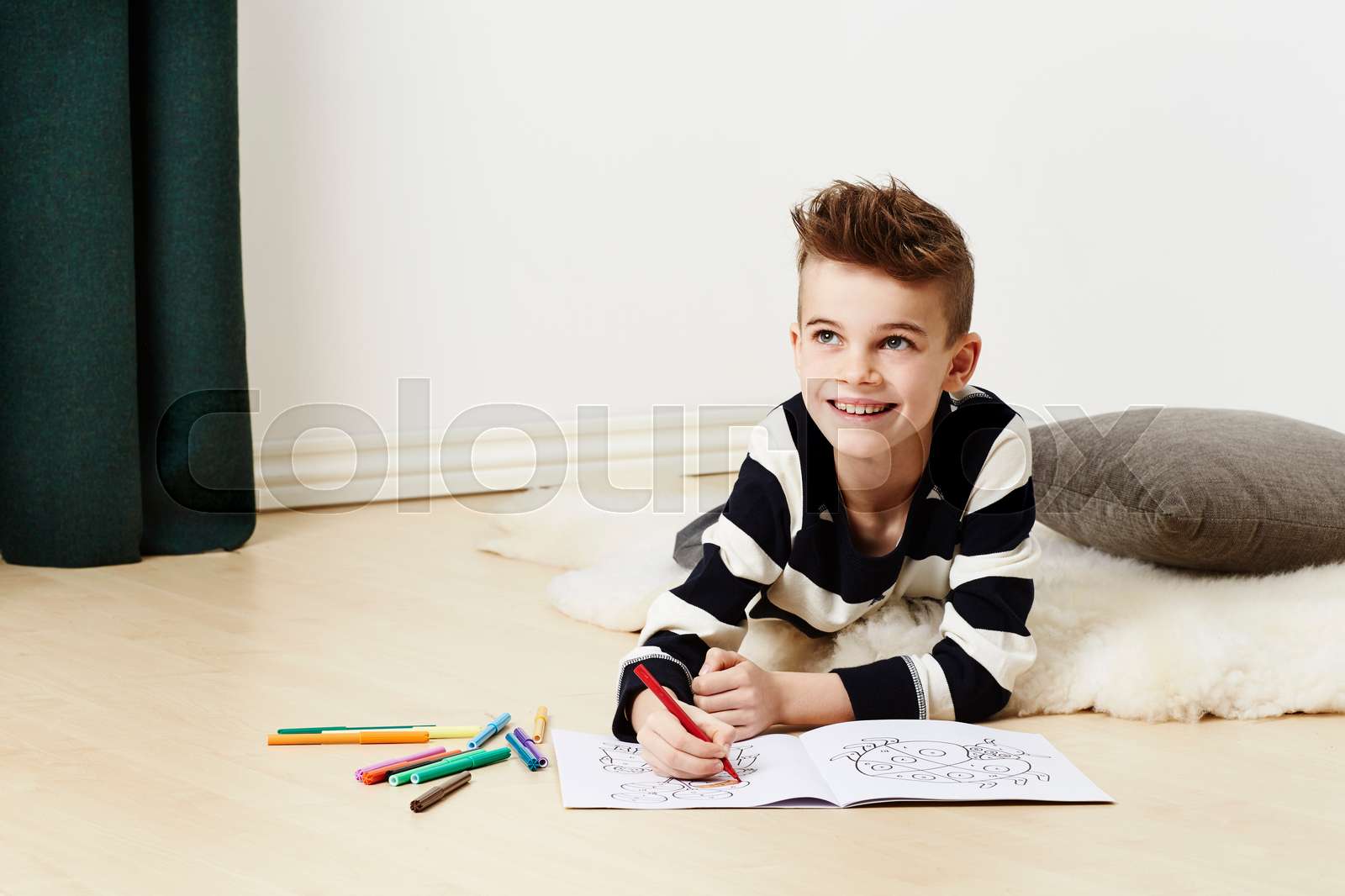 Coloring in kid | Stock image | Colourbox