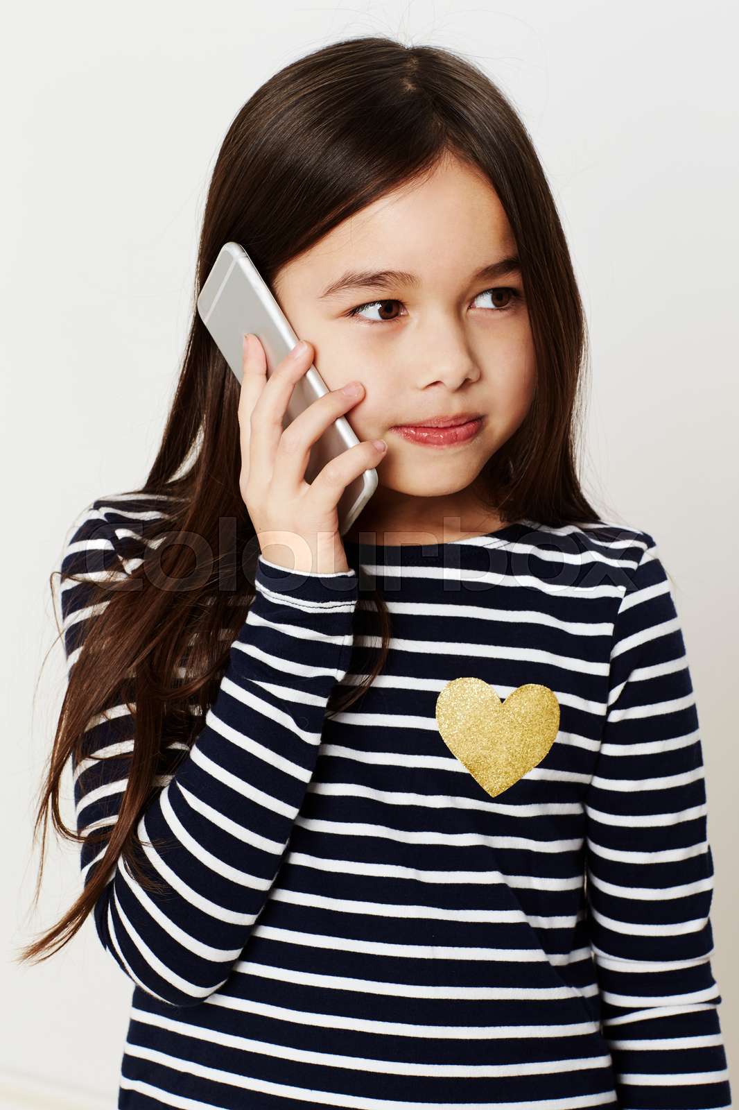 Girl on phone call | Stock image | Colourbox