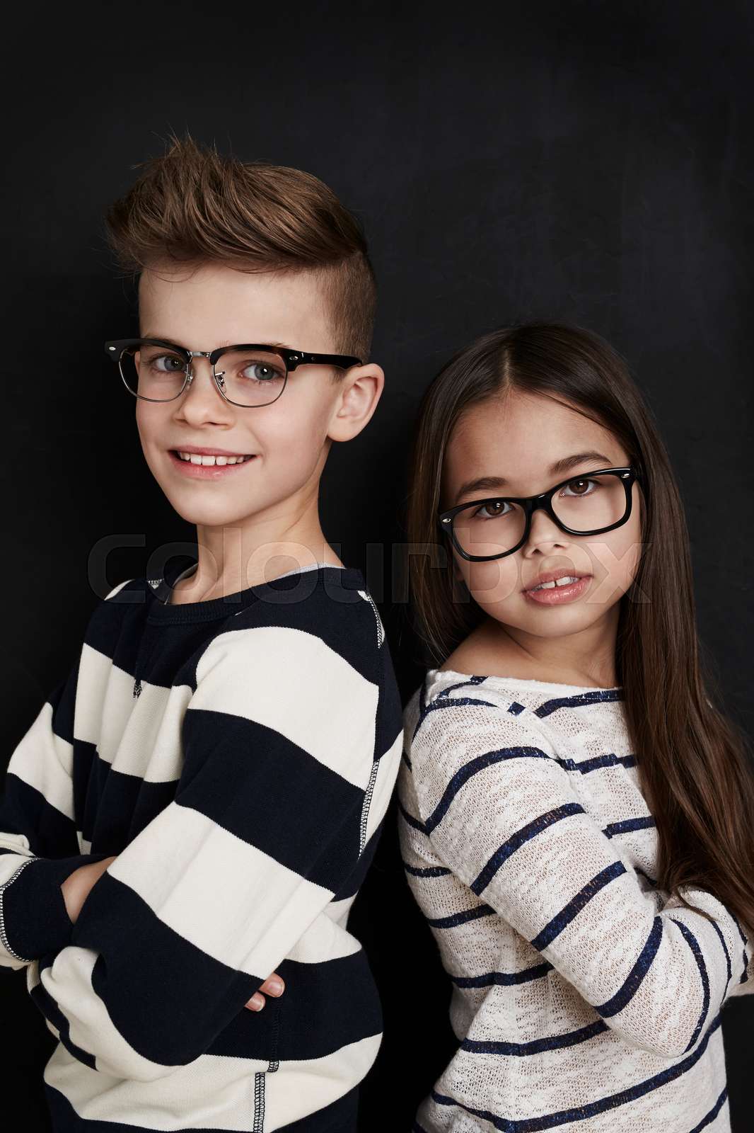 Boy and girl in specs | Stock image | Colourbox