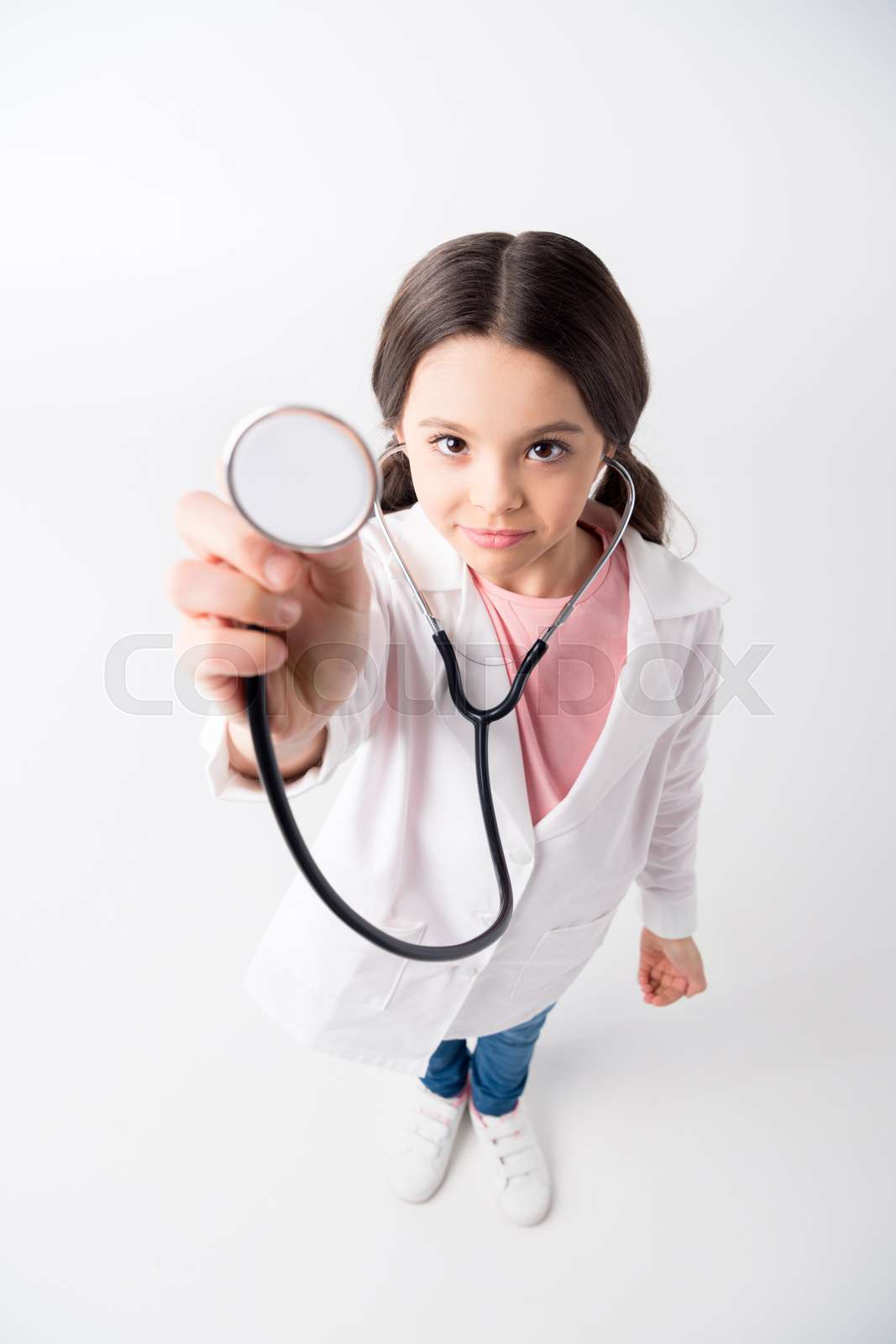 Girl in doctor costume | Stock image | Colourbox