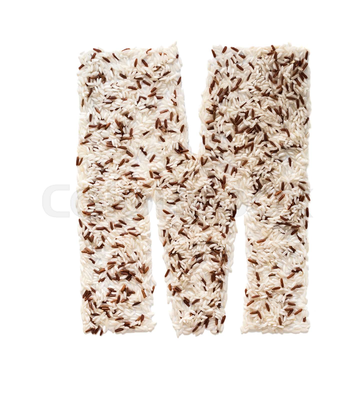 rice grain forming an alphabet letter M | Stock image | Colourbox