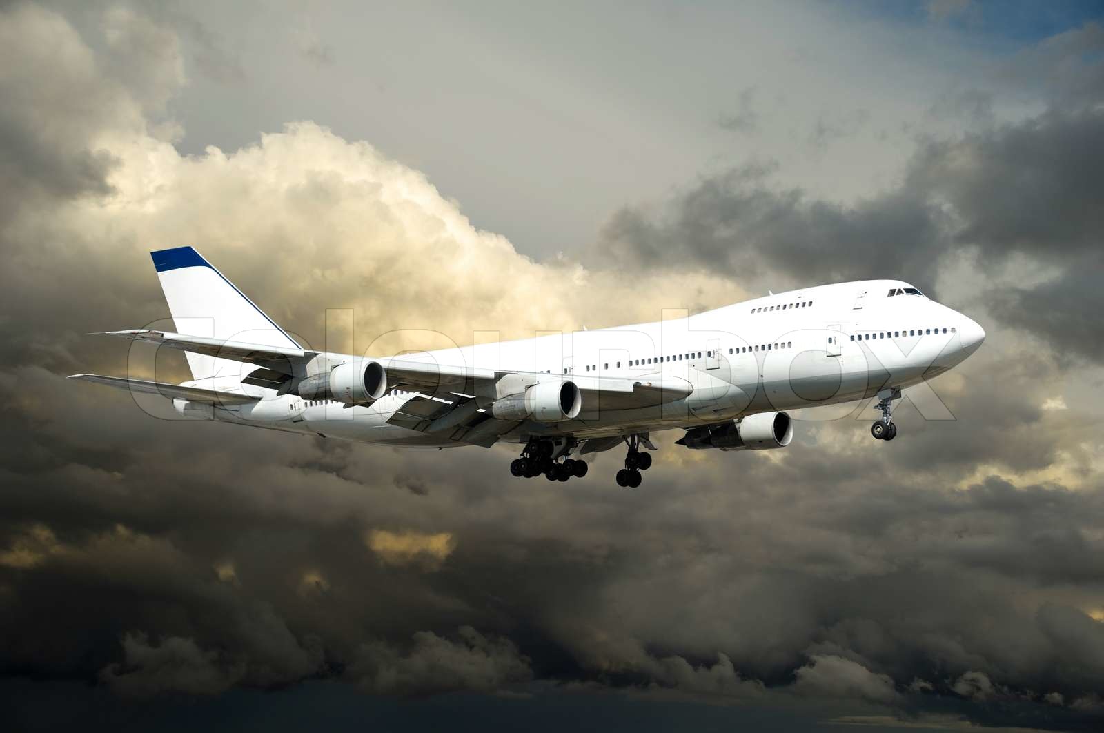 Plane is flying in bad weather | Stock image | Colourbox