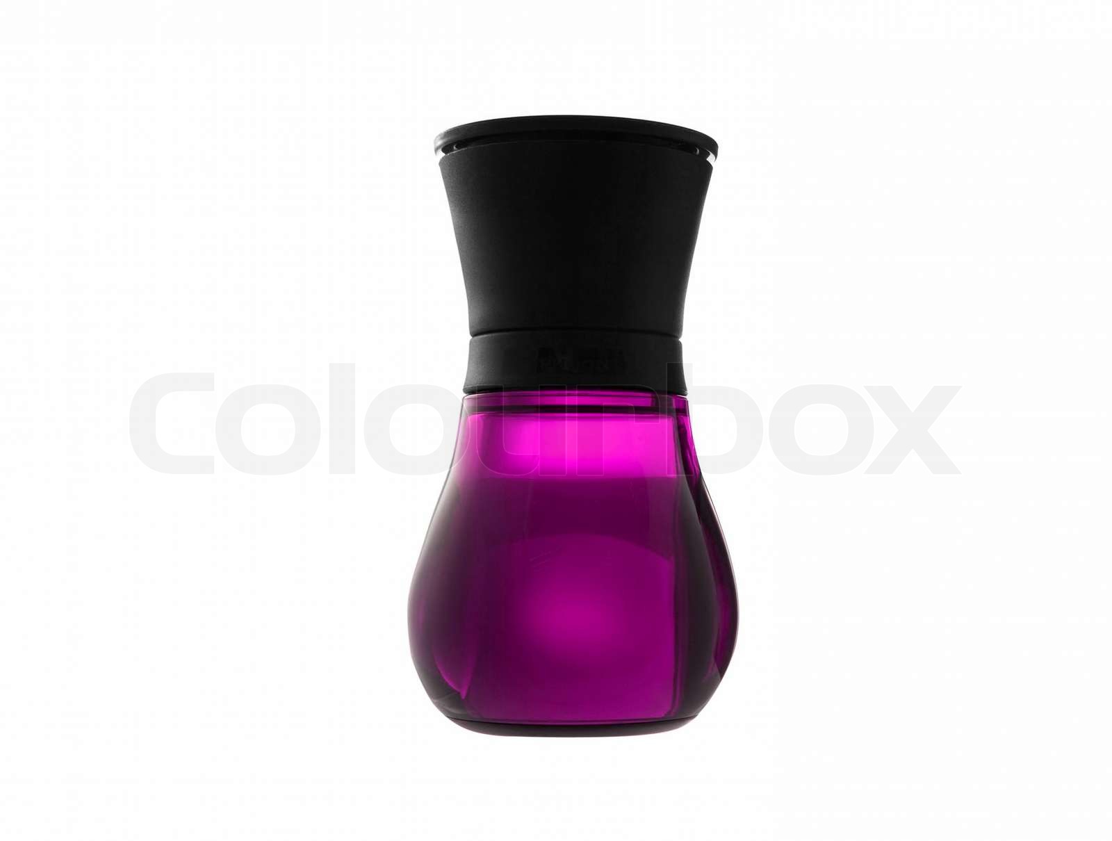 purple Bottle of perfume isolated on white | Stock image | Colourbox