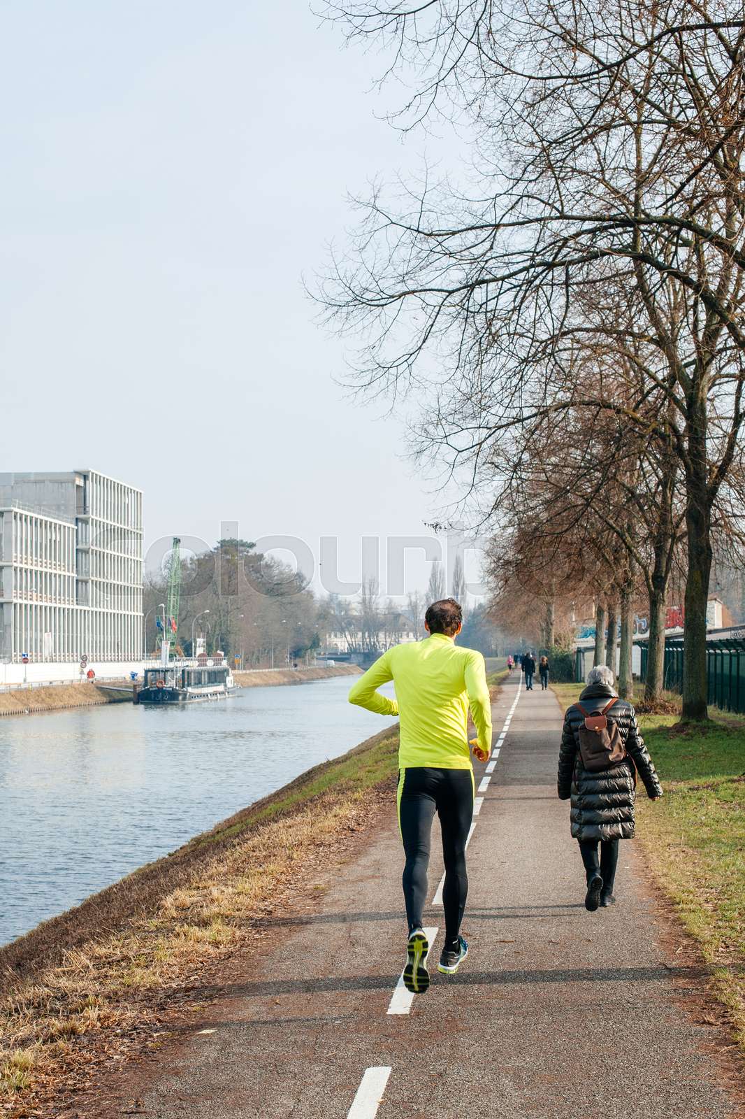 Man running - rear view running fast | Stock image | Colourbox