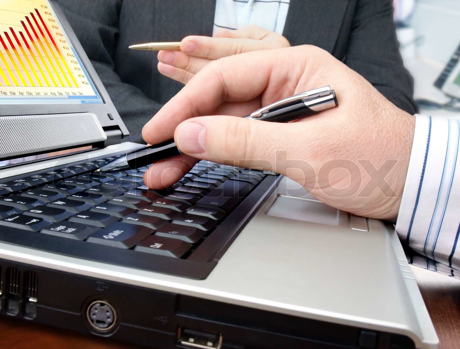 Analyzing Data And Charts On Computer Screen Stock Image Colourbox