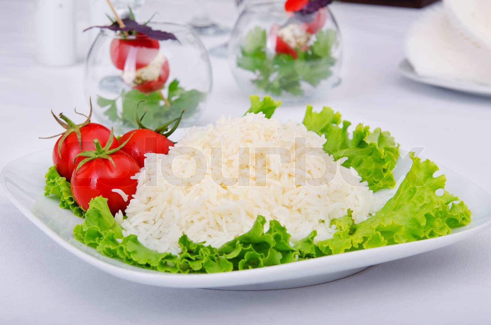 Plain rice served in the plate | Stock image | Colourbox