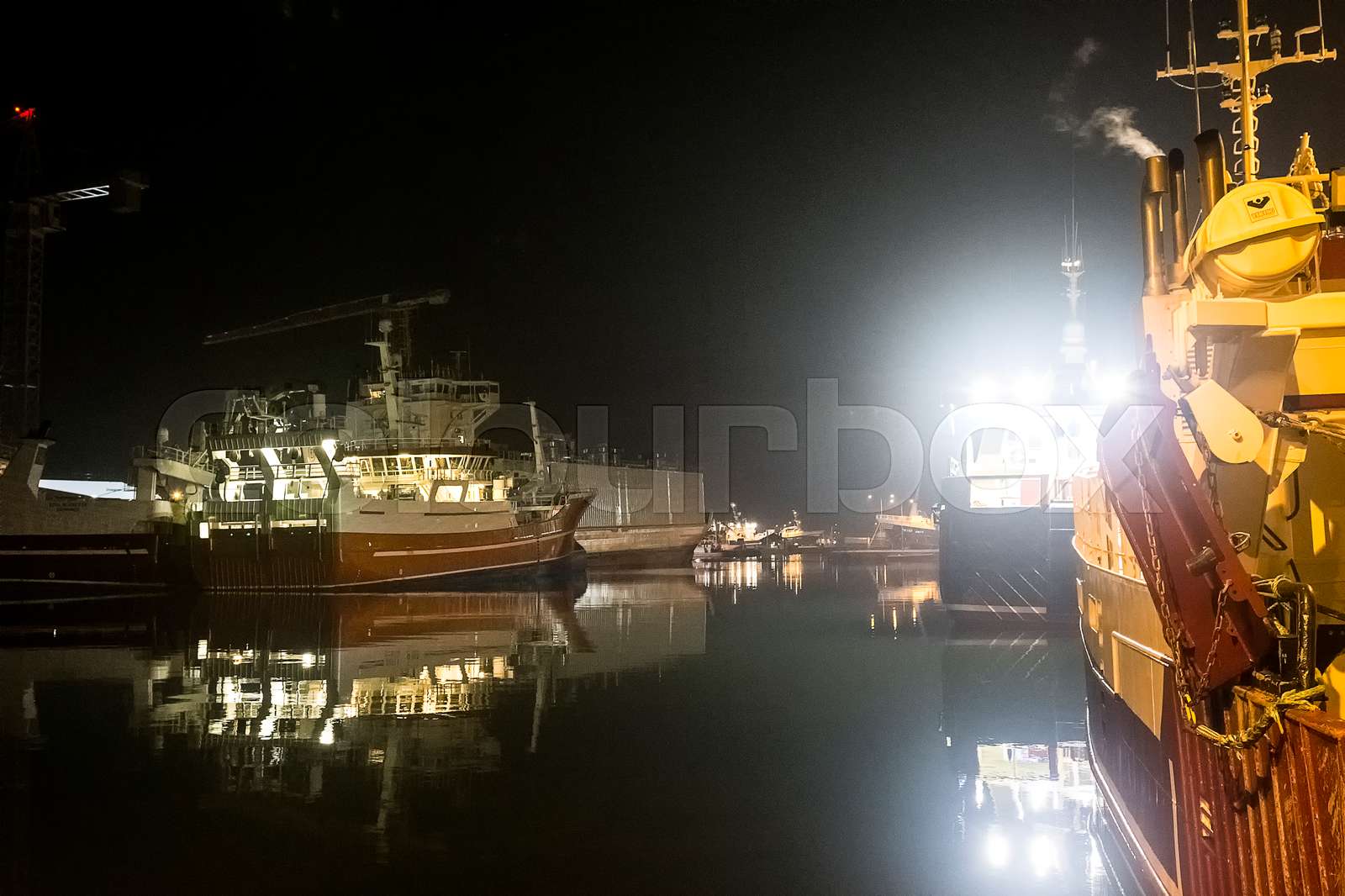 Giant trawlers in port waiting for the next big catch on the high seas ...