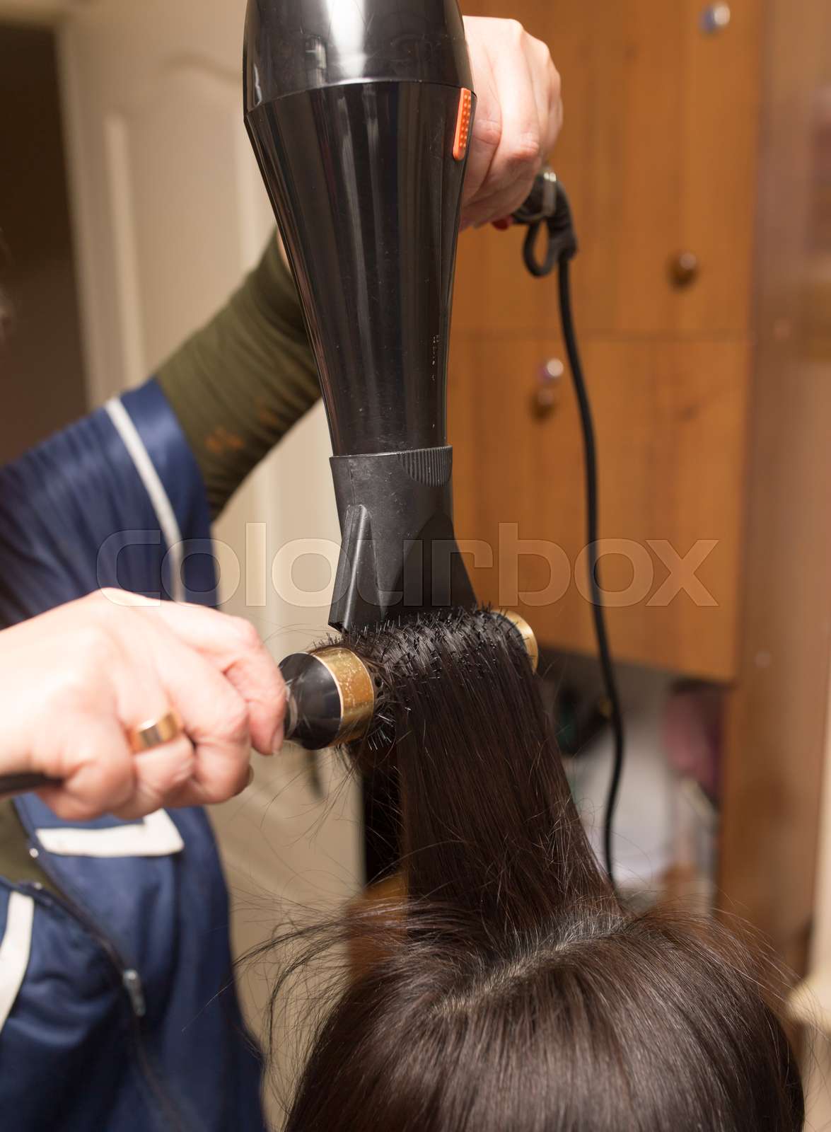 Styling female hair dryer | Stock image | Colourbox