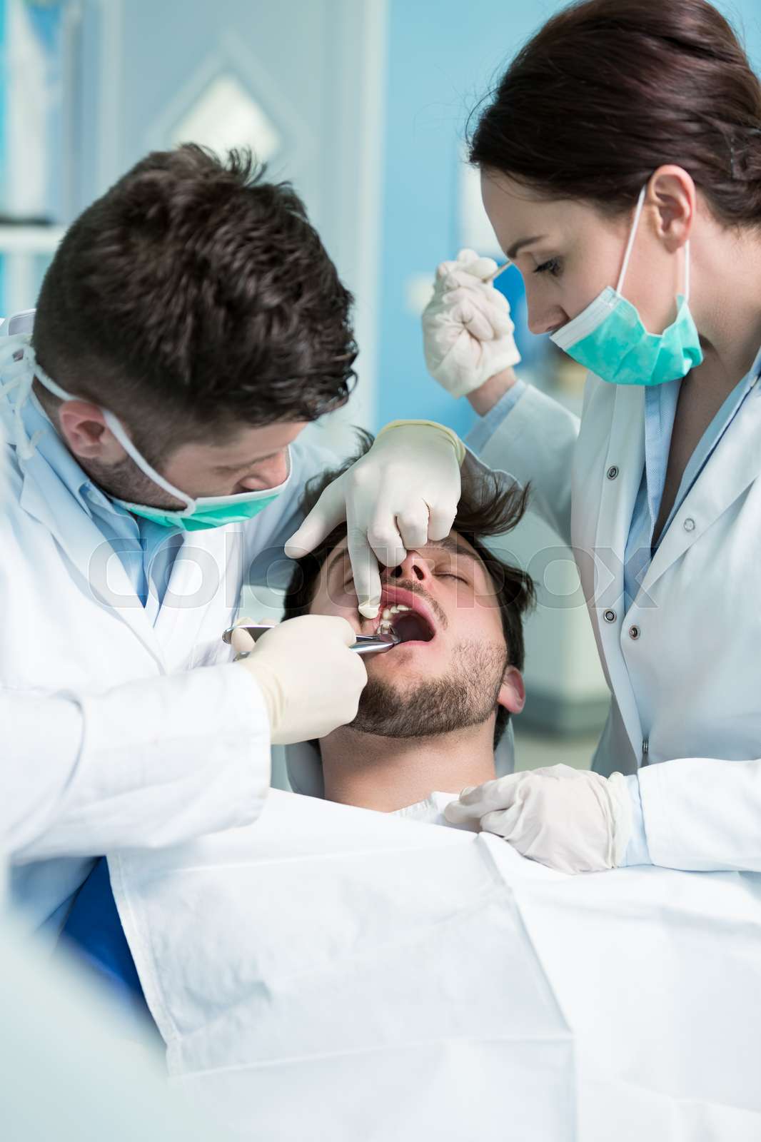 Dentistry education. Male dentist doctor teacher explaining treatment ...