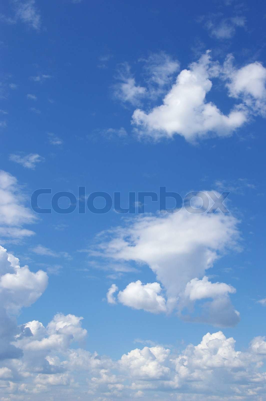 Hvide skyer på en blå himmel | Stock foto | Colourbox