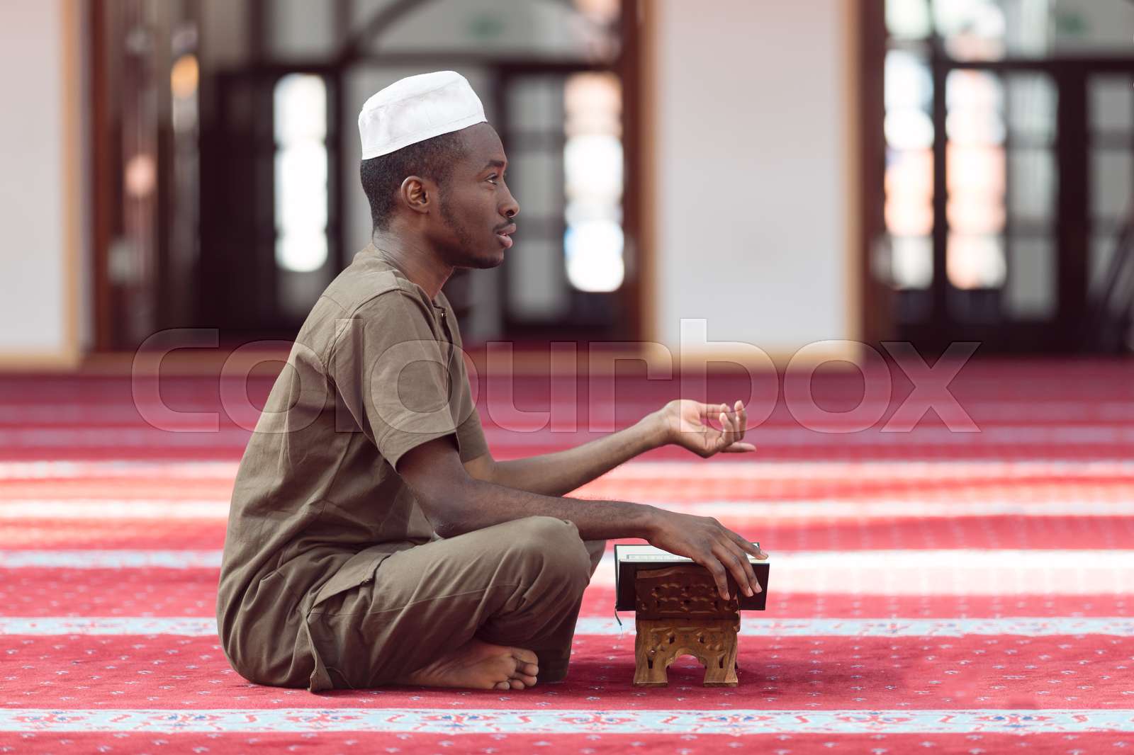 Black African Muslim Man Reading Holy Islamic Book Koran | Stock image ...