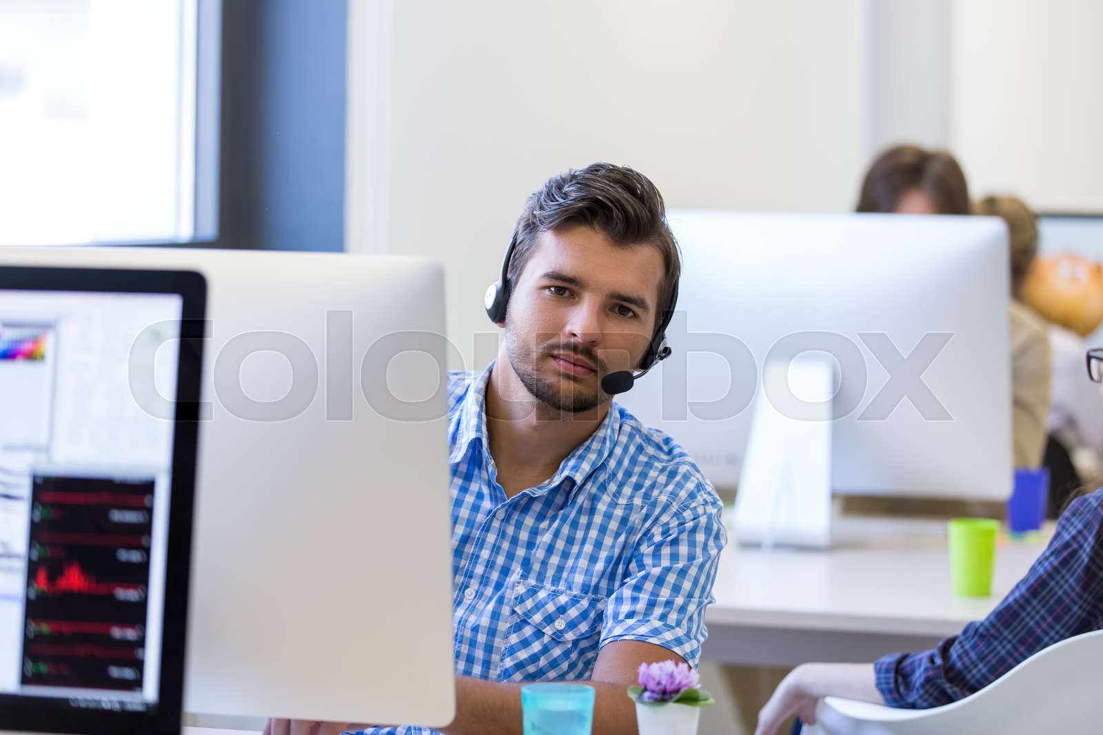 startup business, software developer working on desktop computer ...