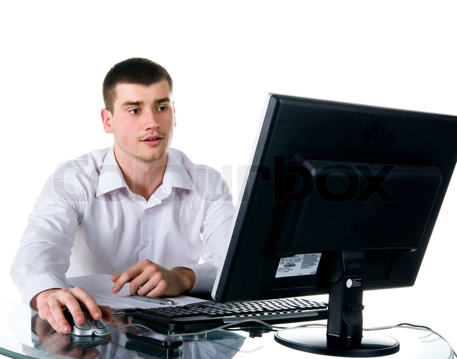 Businessmen sits at the computer | Stock image | Colourbox