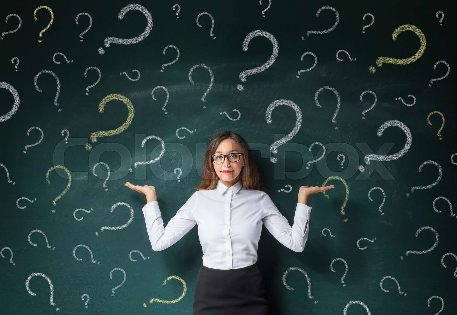 Businesswoman with question mark | Stock image | Colourbox