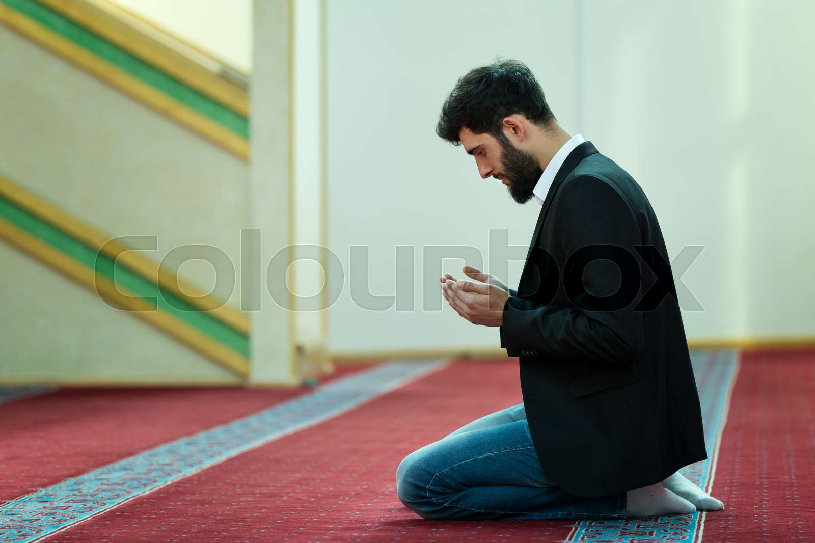 Young beautiful Muslim Man Praying In Mosque | Stock image | Colourbox