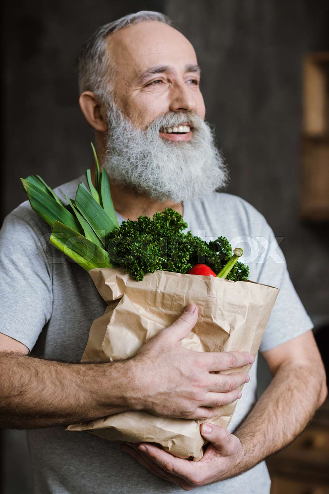 Man with fresh vegetables | Stock image | Colourbox