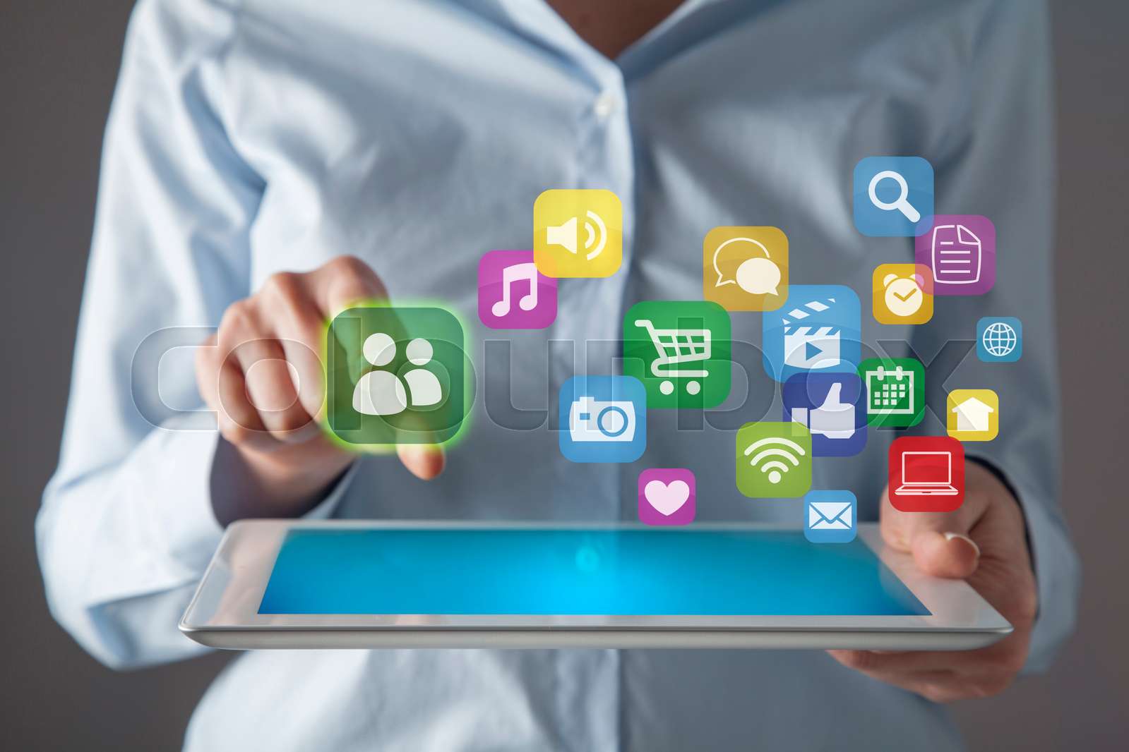 Tablet in hands | Stock image | Colourbox