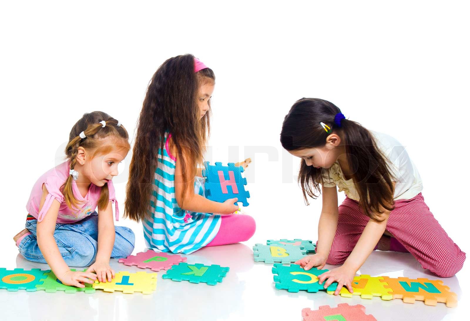 children are playing letters isolated on the white background | Stock ...