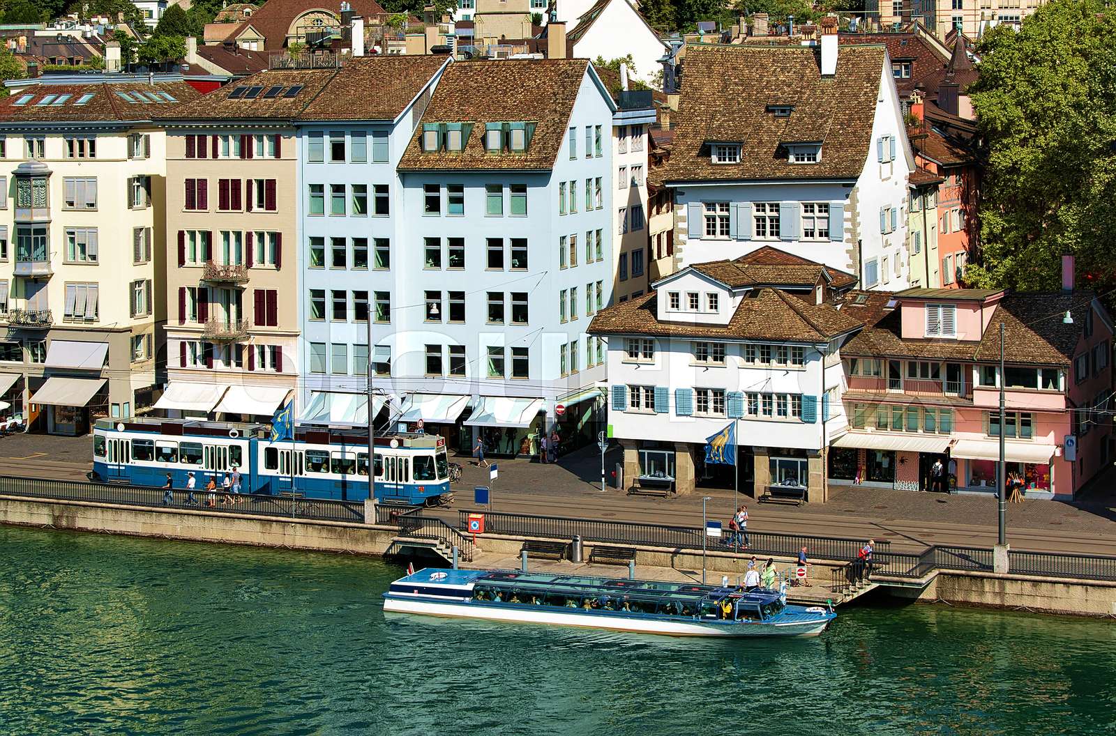 Tram and ferry boat at Limmatquai in city center Zurich | Stock image ...