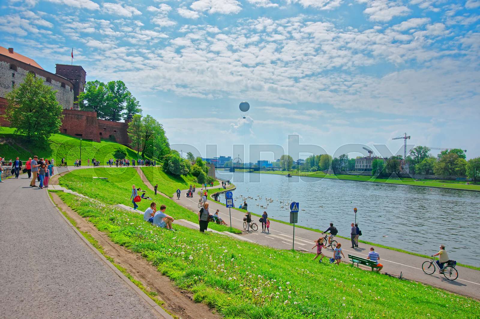 People and Wawel at embankment of Visla River Krakow | Stock image ...