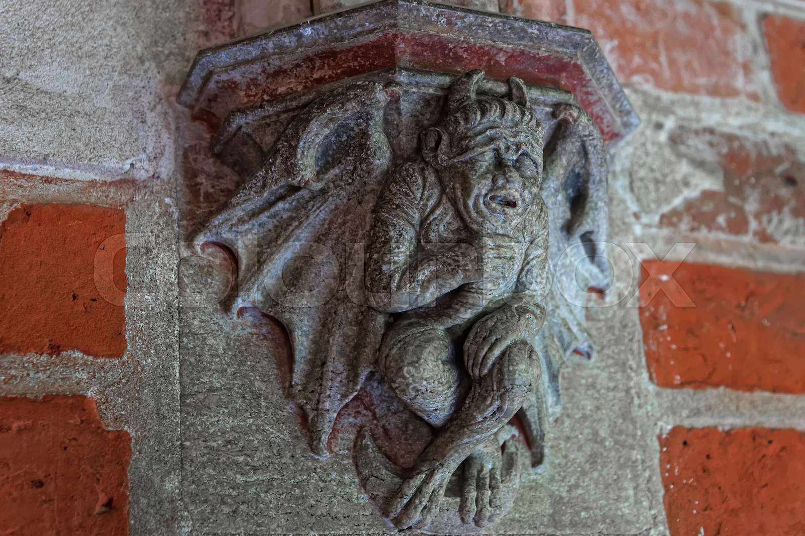 Devil at toilet in Malbork Castle | Stock image | Colourbox