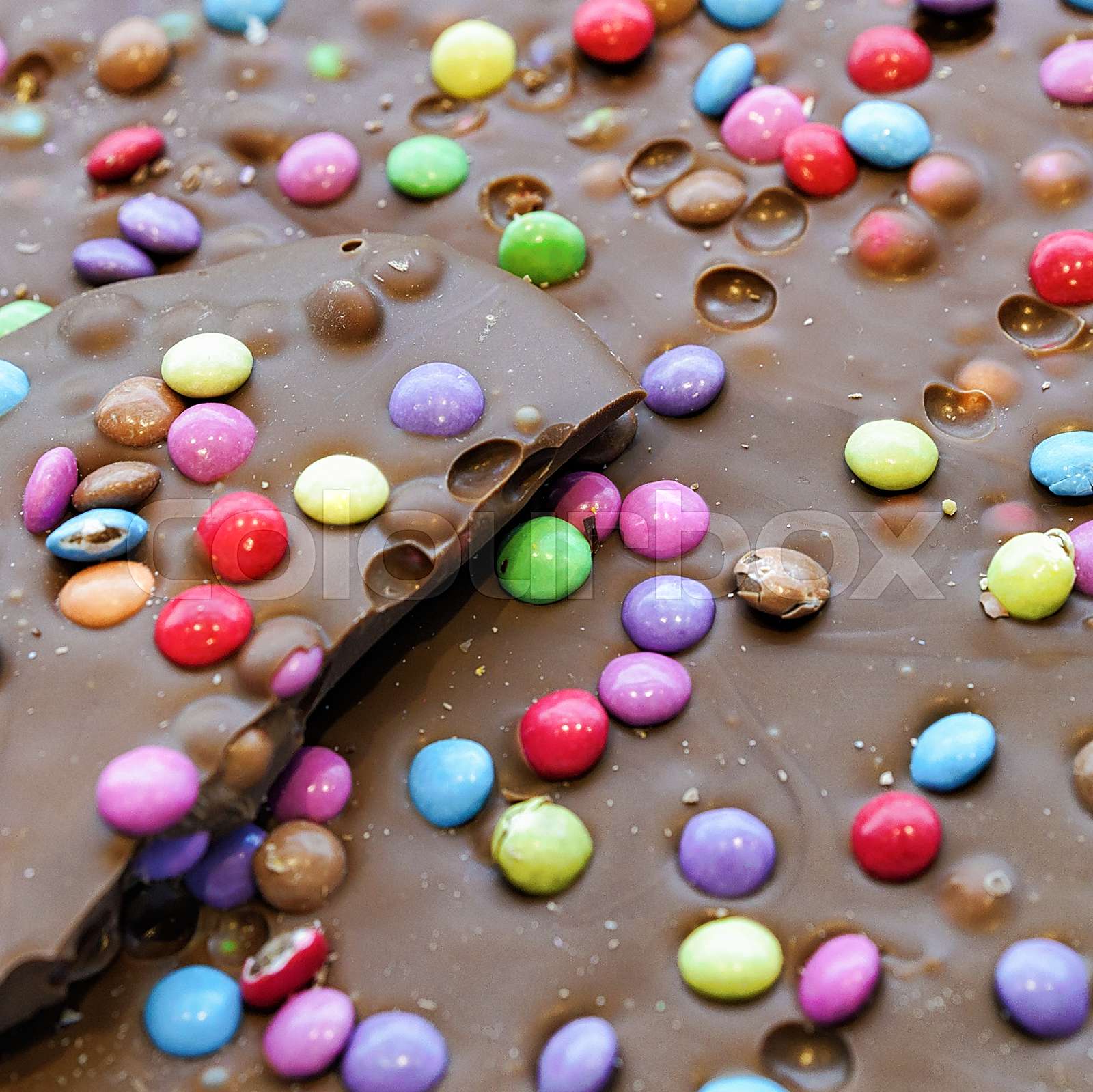 Swiss chocolate bars with candy | Stock image | Colourbox