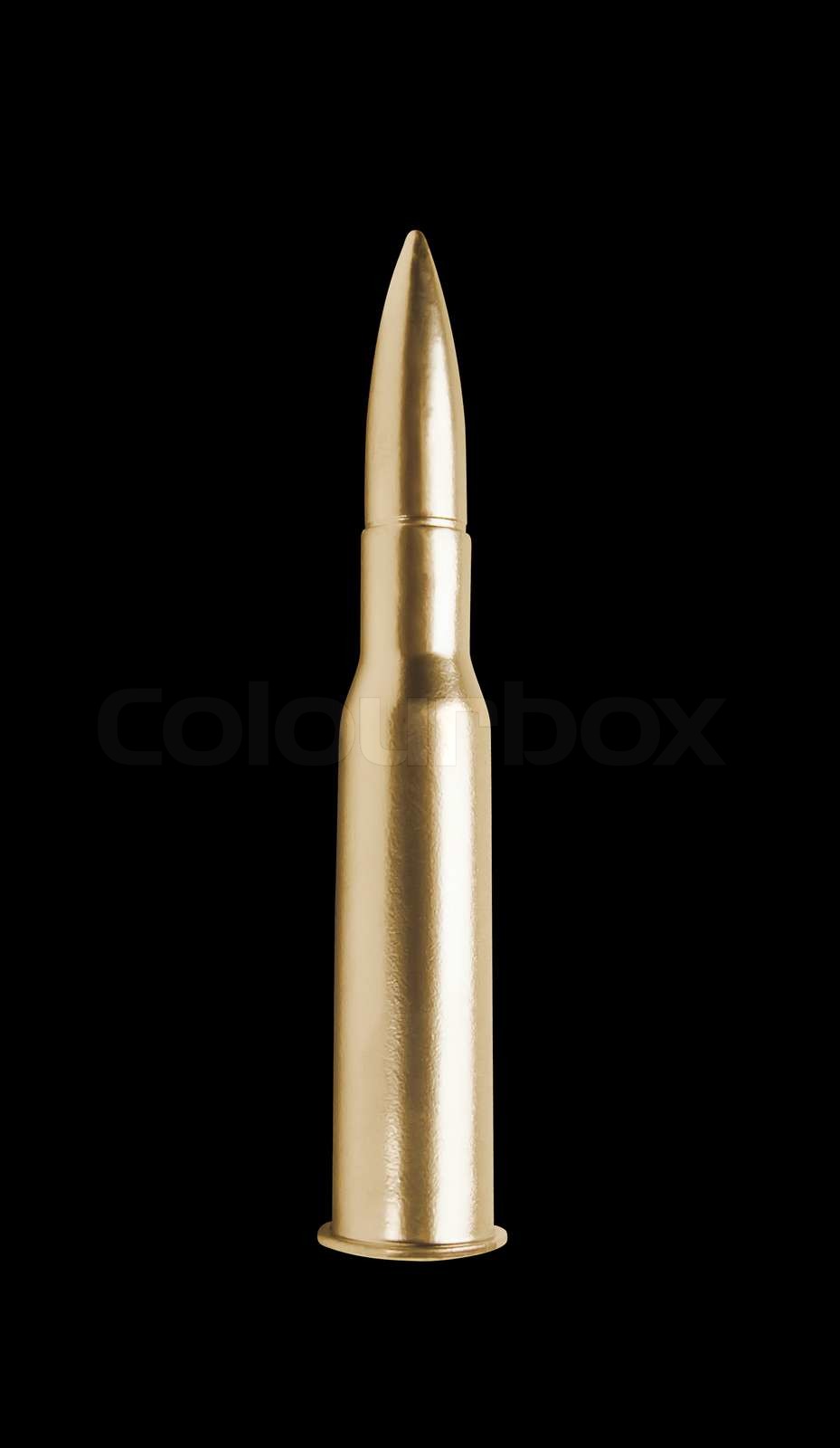 golden gun bullet isolated on black background | Stock image | Colourbox