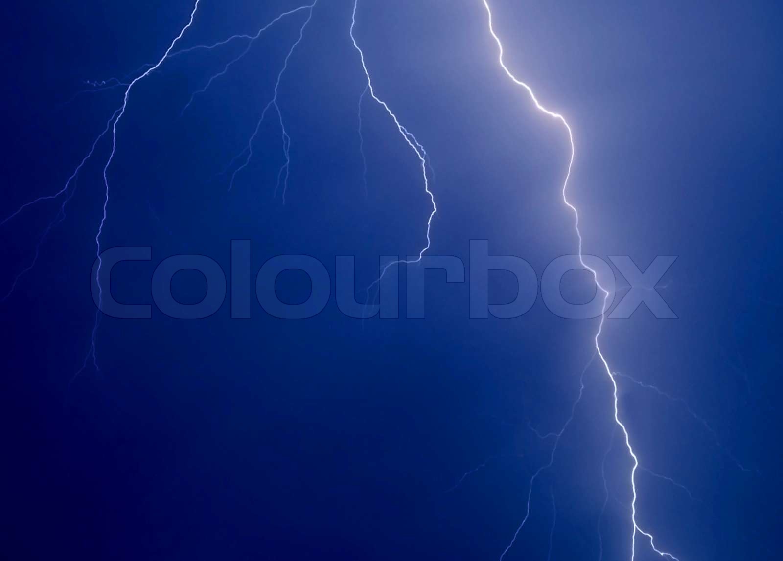lightning strike in the darkness close up | Stock image | Colourbox