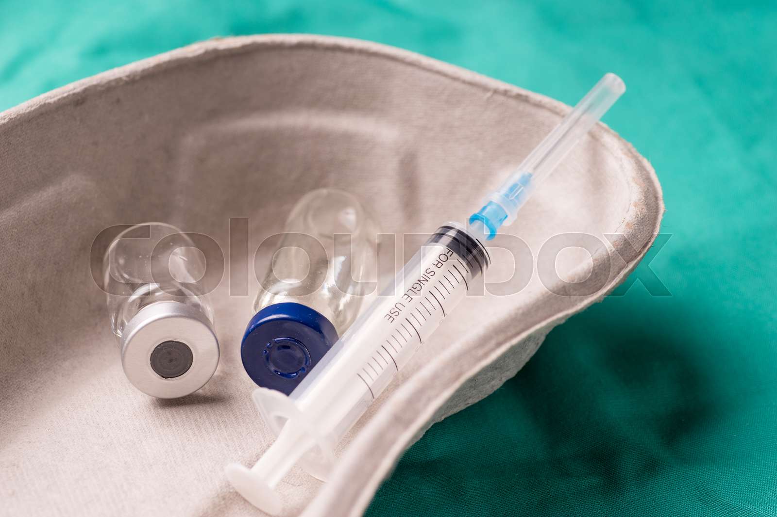 Medical syringe and vials Is in a one use capsule | Stock image | Colourbox