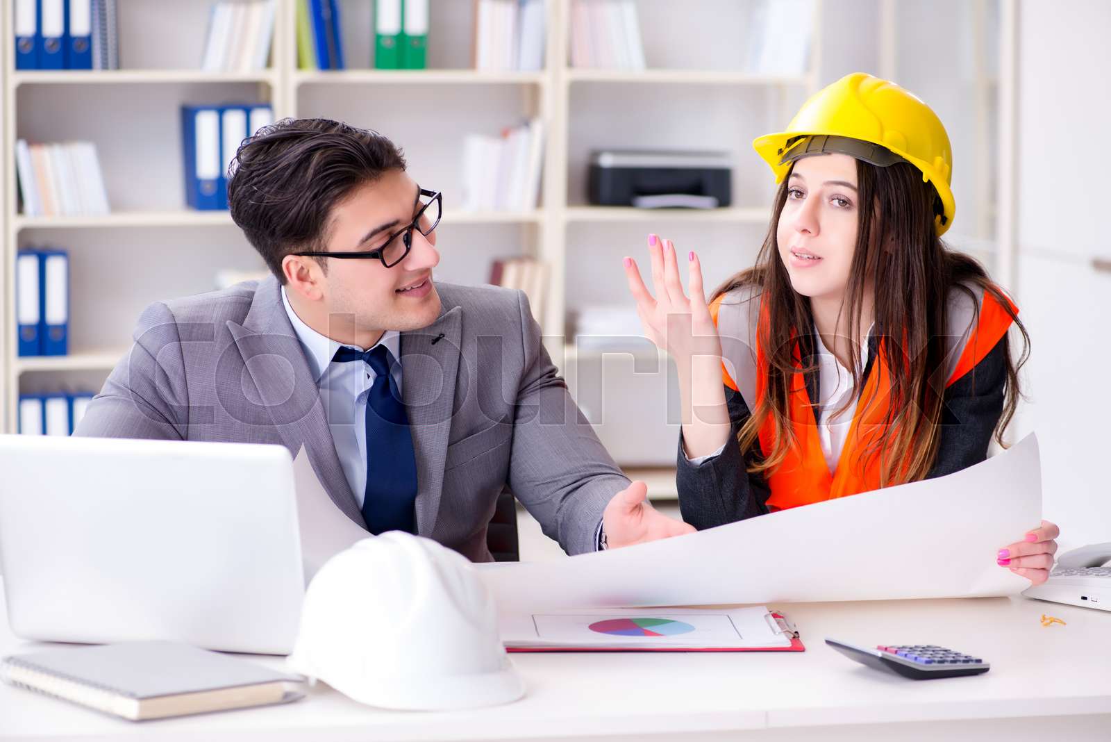 Construction foreman supervisor reviewing drawings | Stock image ...