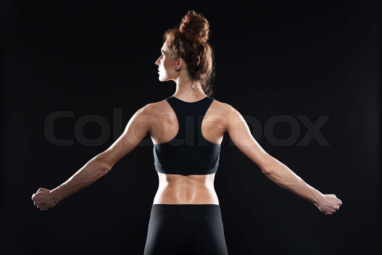 Back view image of young sports lady | Stock image | Colourbox