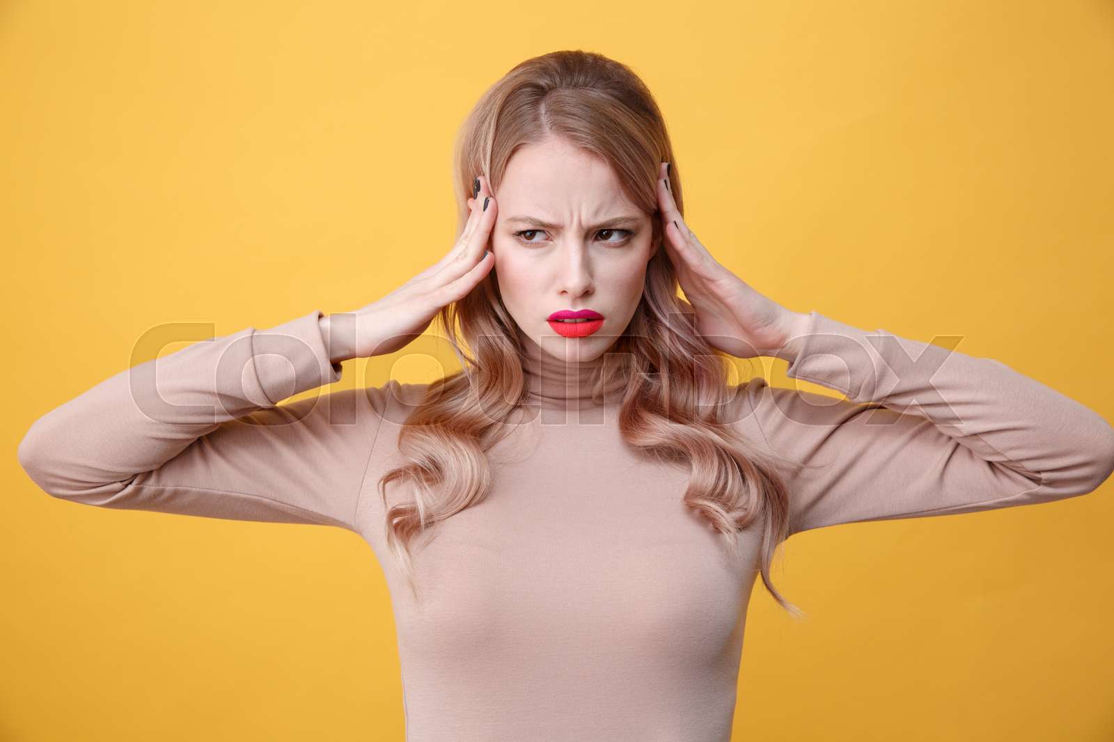 Confused sad young blonde lady with bright makeup lips | Stock image ...