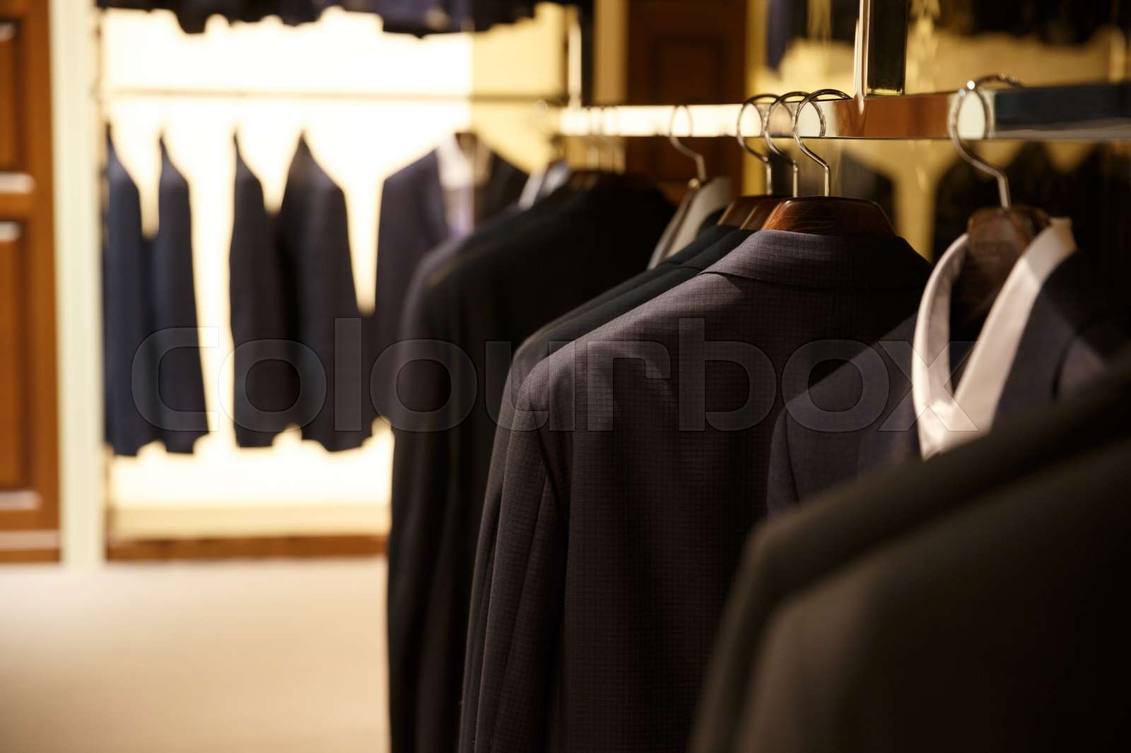 Picture of suits in a shop | Stock image | Colourbox