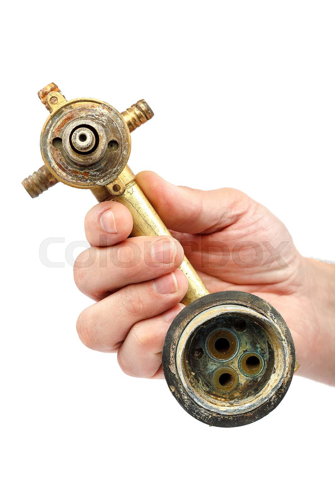 Old broken faucets for the shower in the hand | Stock image | Colourbox