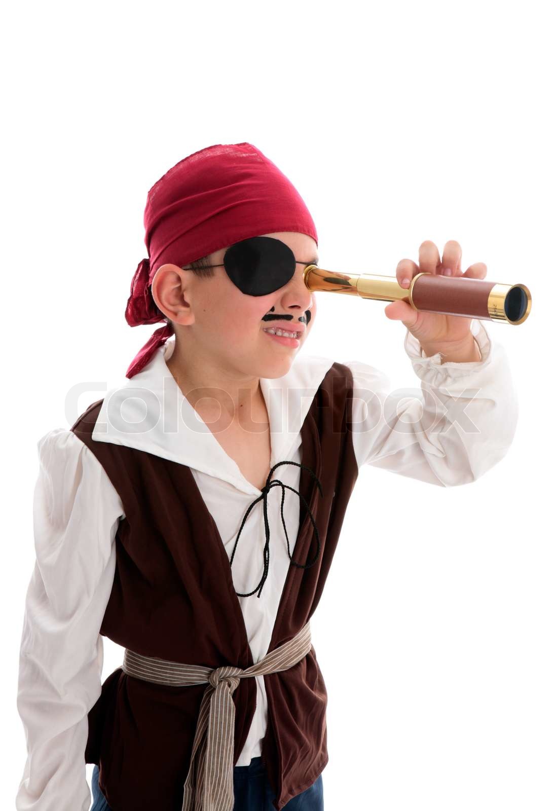 A young boy pirate looking through a monoscope in search of treasure or ...