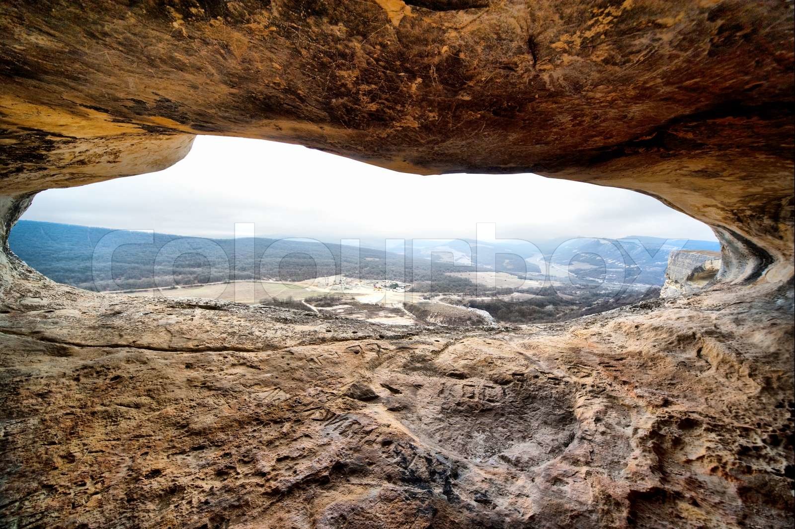 Beautiful landscape view from a cave in the rock | Stock image | Colourbox