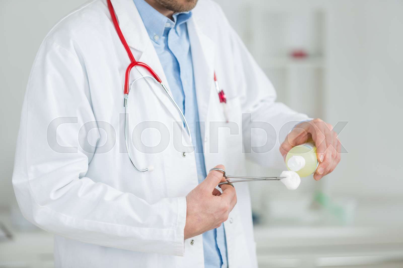 medical doctor using sanitizer dispenser | Stock image | Colourbox