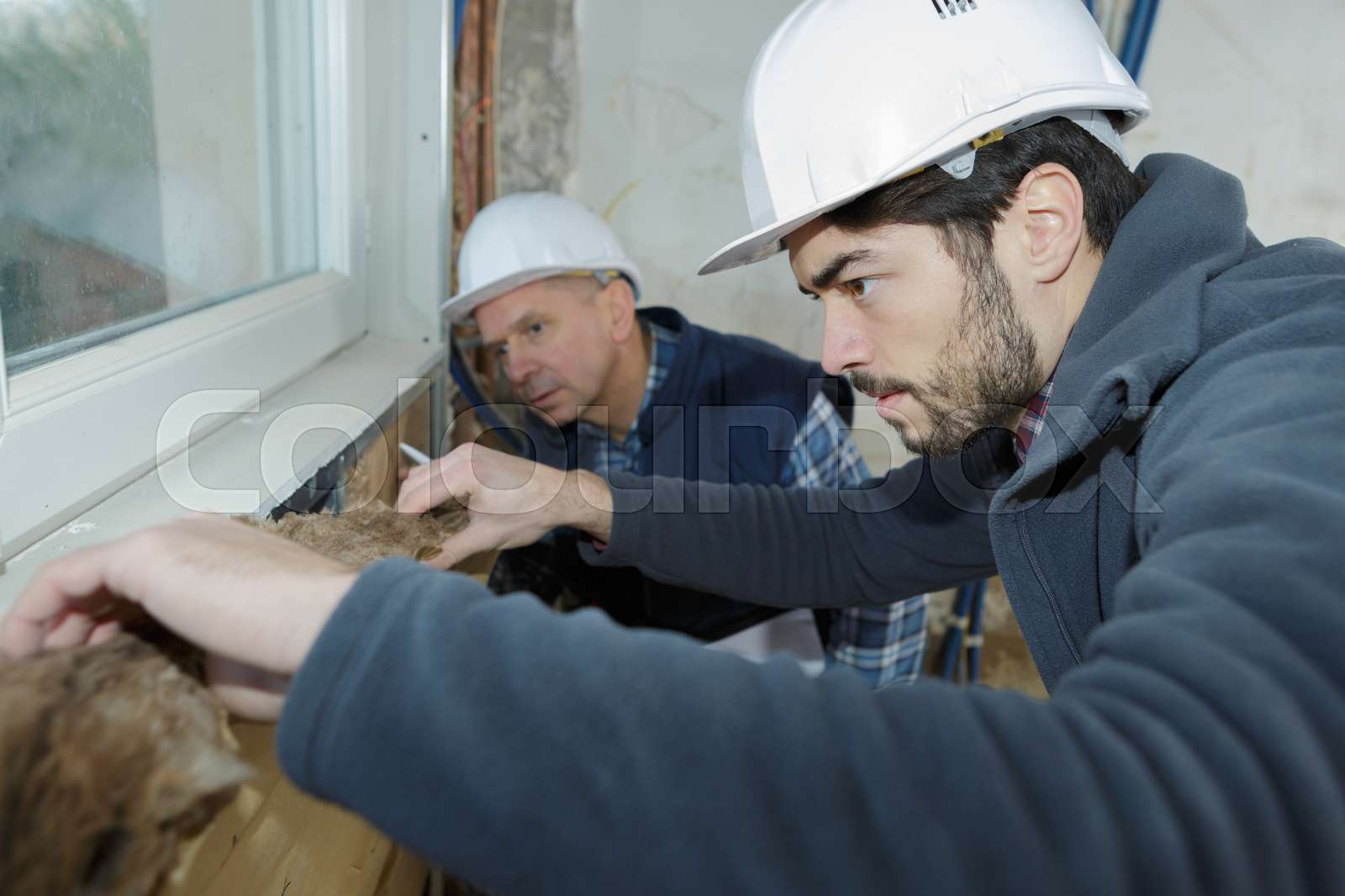 windows installation workers | Stock image | Colourbox