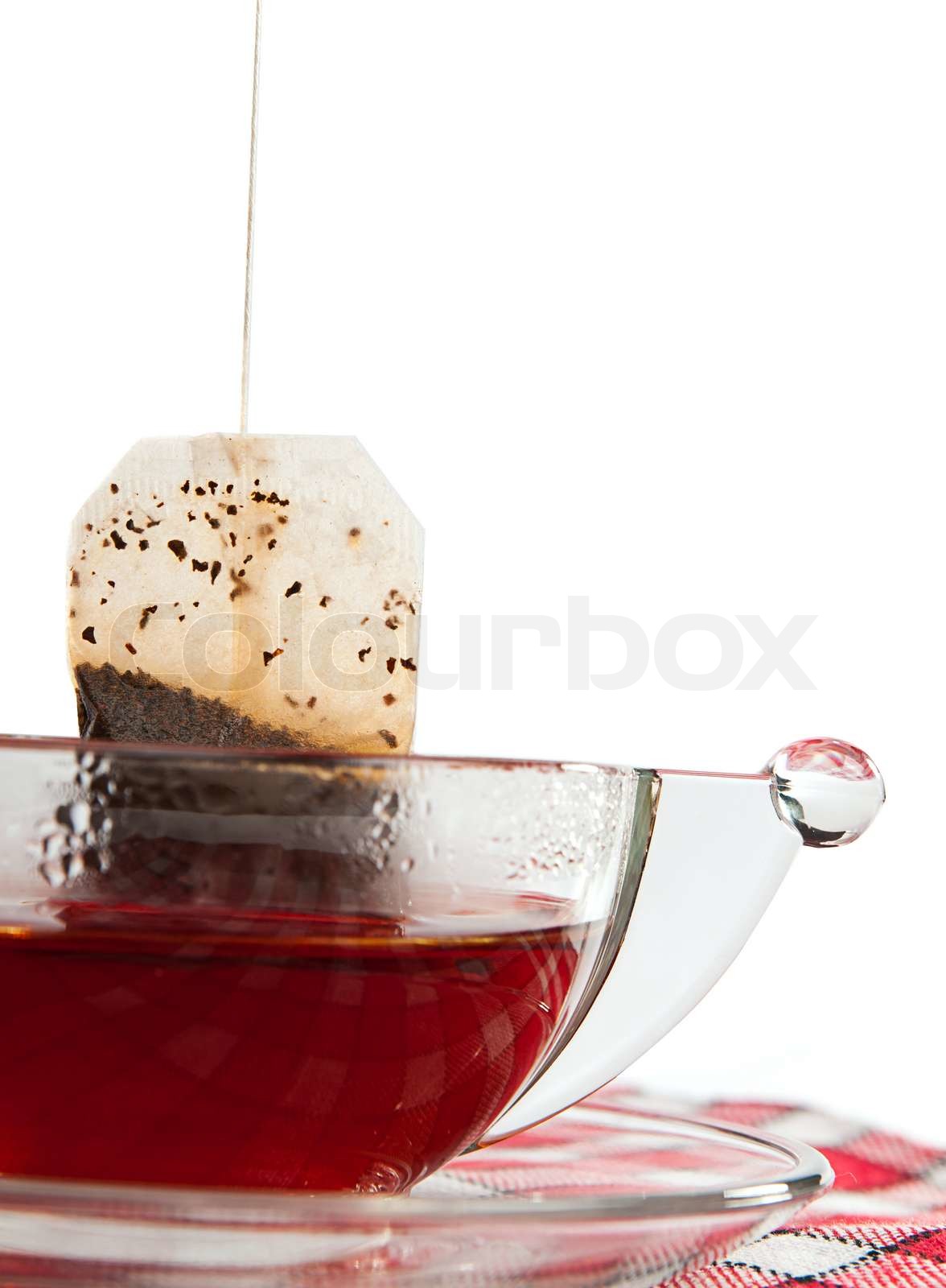 transparent cup of tea and tea bag | Stock image | Colourbox