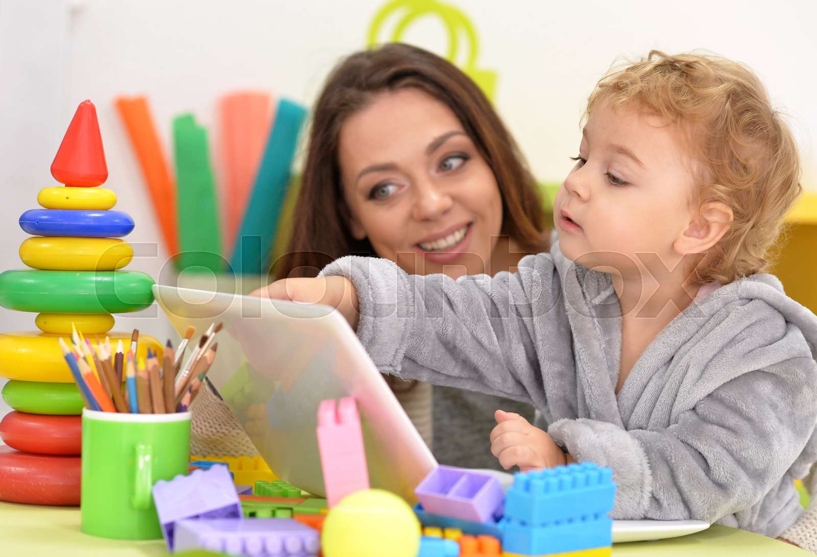 Mom and daughter doing lessons | Stock image | Colourbox