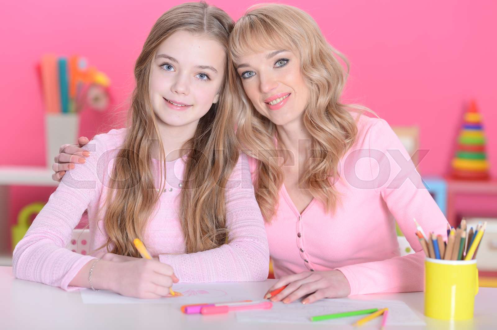Mother and daughter doing lessons | Stock image | Colourbox