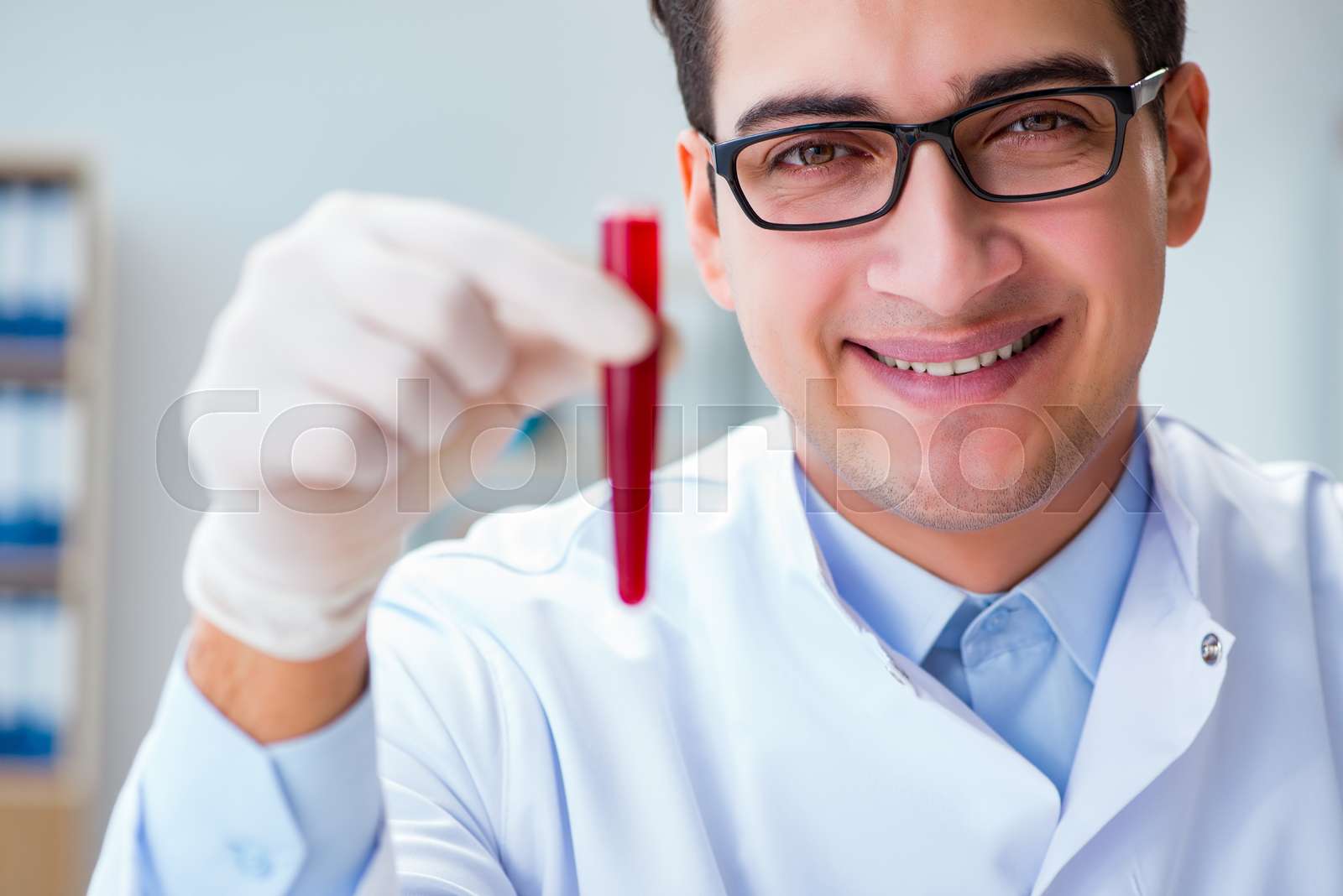 Doctor working with blood samples | Stock image | Colourbox