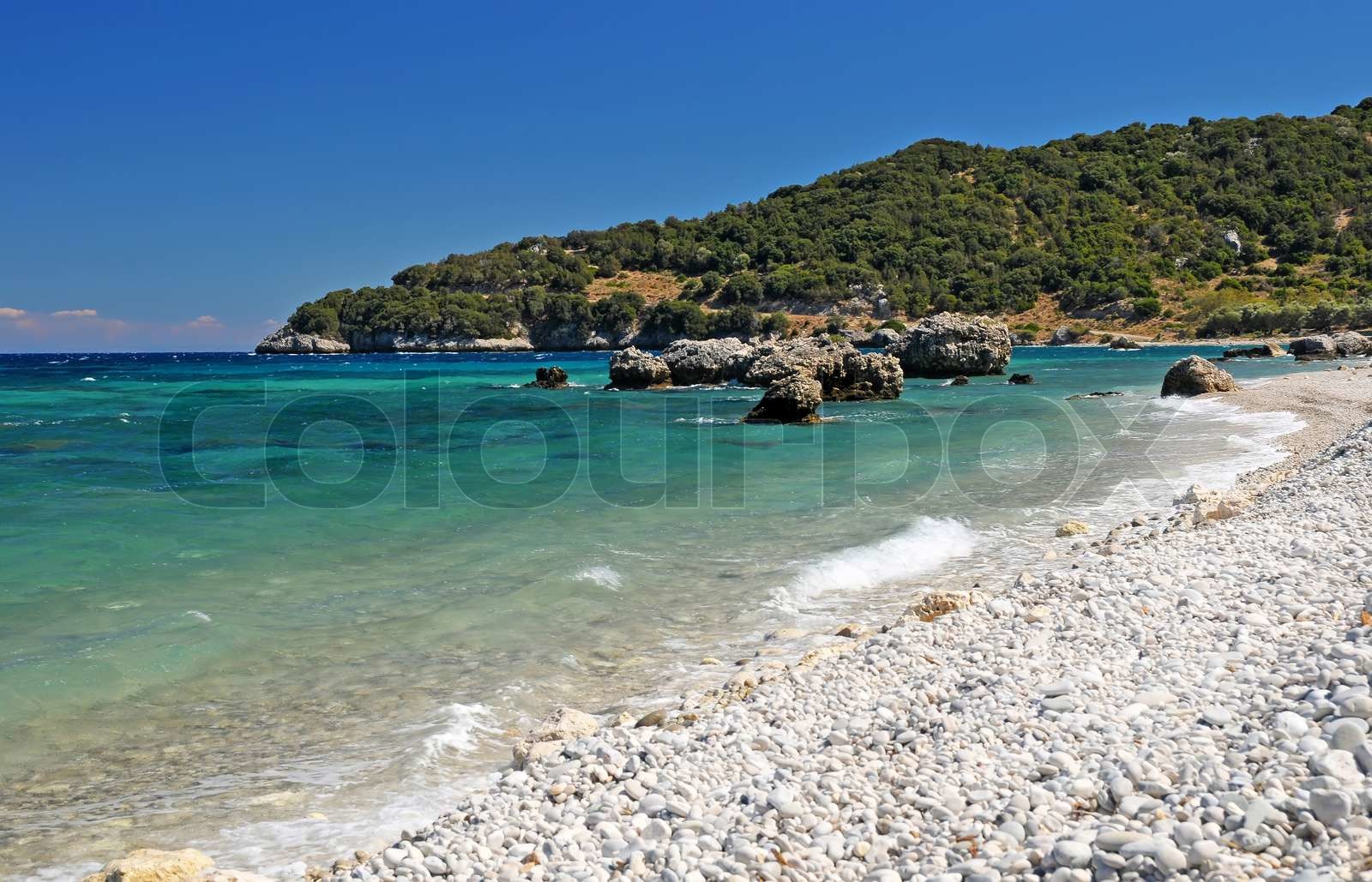 White pebble beach on the island of Kefalonia, Greece | Stock image ...