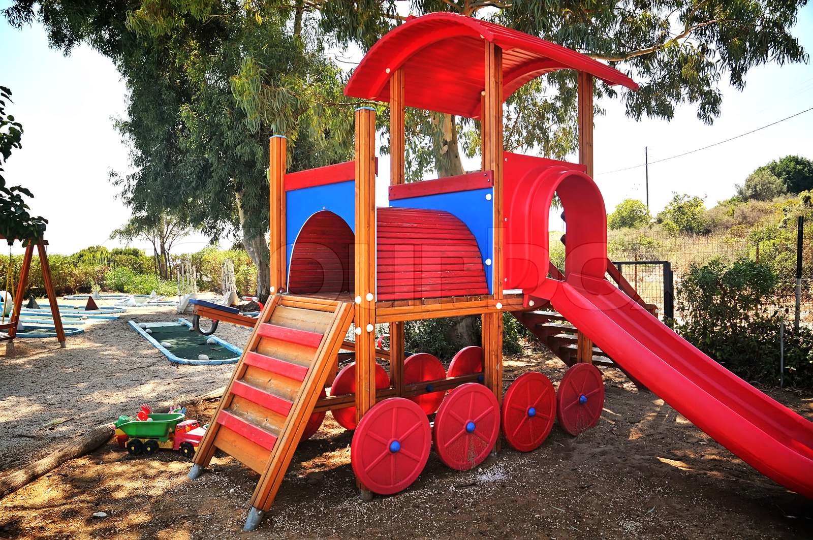 A Red and blue playground and sandpit | Stock image | Colourbox
