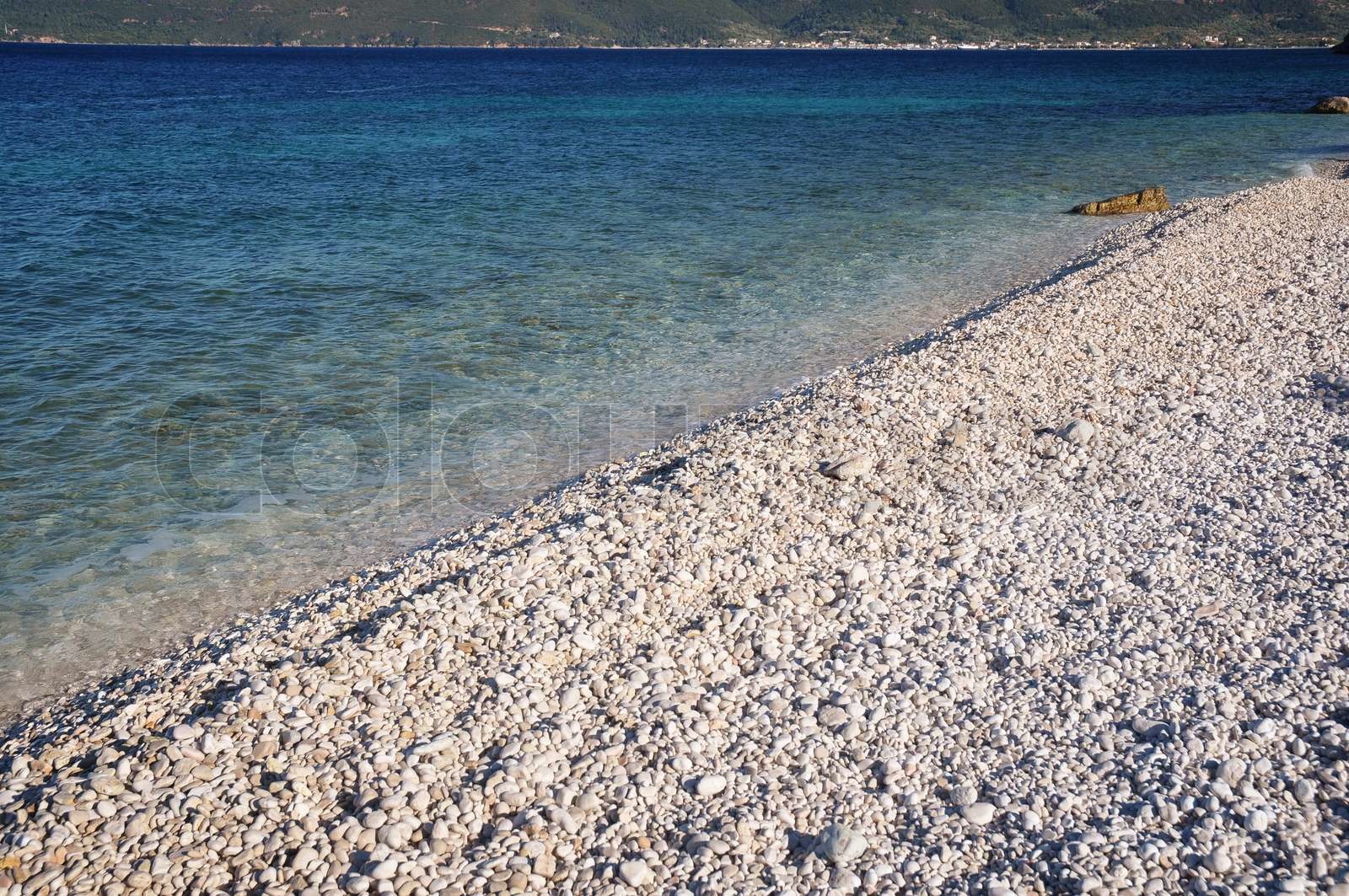 White pebble beach on the island of Kefalonia, Greece | Stock image ...